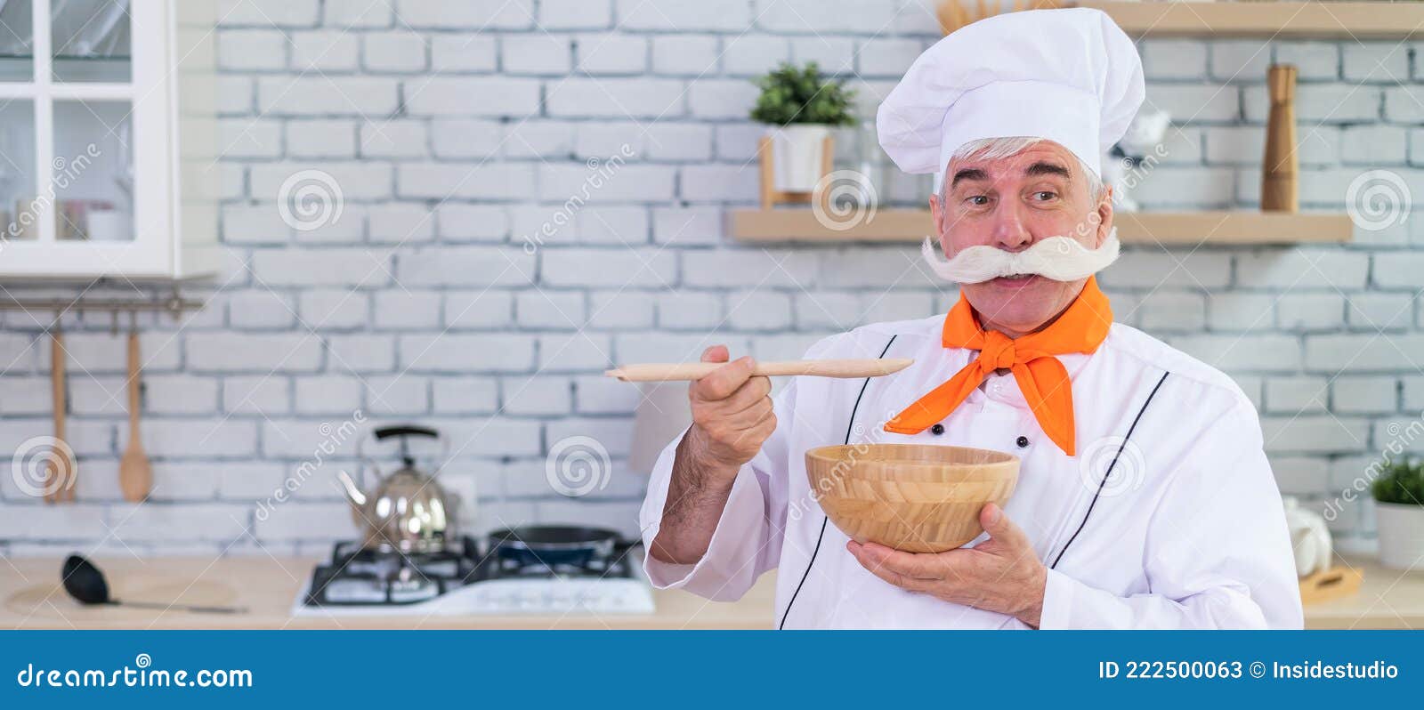 An Old Man with a Bushy Gray Mustache in a Chef& X27;s Hat is Cooking ...