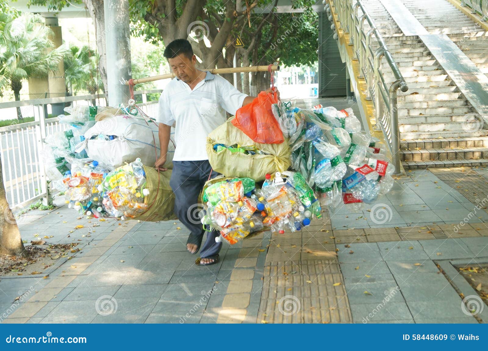 The Old Man Carrying a Load of Waste Plastic Bottles Editorial Stock ...