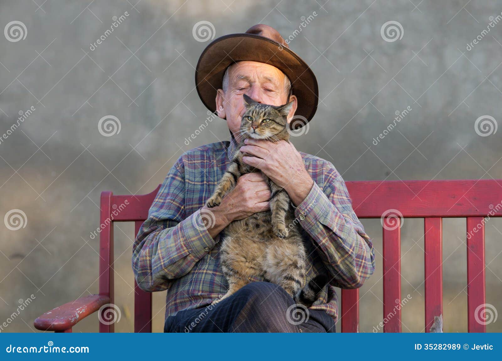 Old man with cat stock image. Image of happy, kissing - 35282989