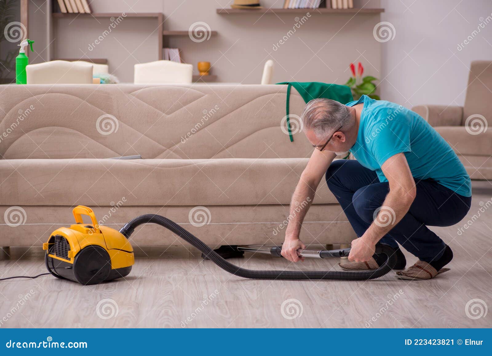 Old man cleaning the house stock image. Image of cleaner - 223423821