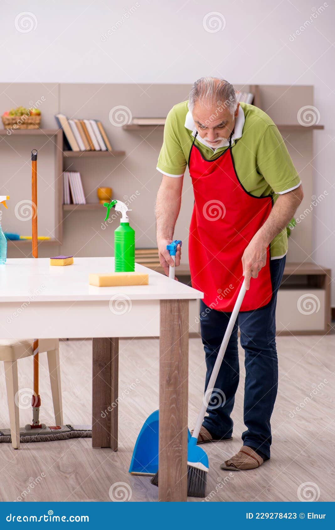 Old man cleaning the house stock image. Image of domestic - 229278423