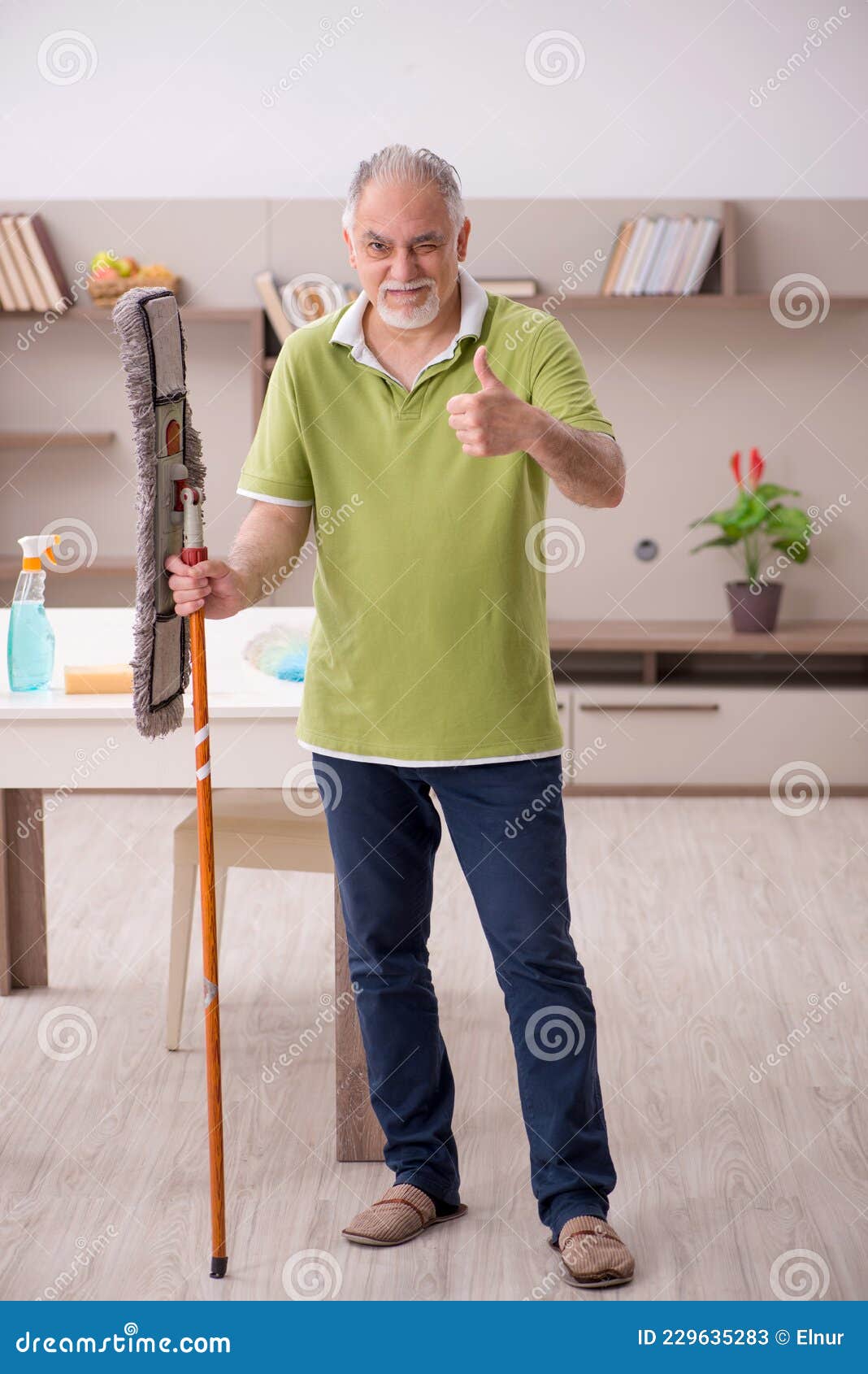 Old man cleaning the house stock image. Image of housekeeping - 229635283
