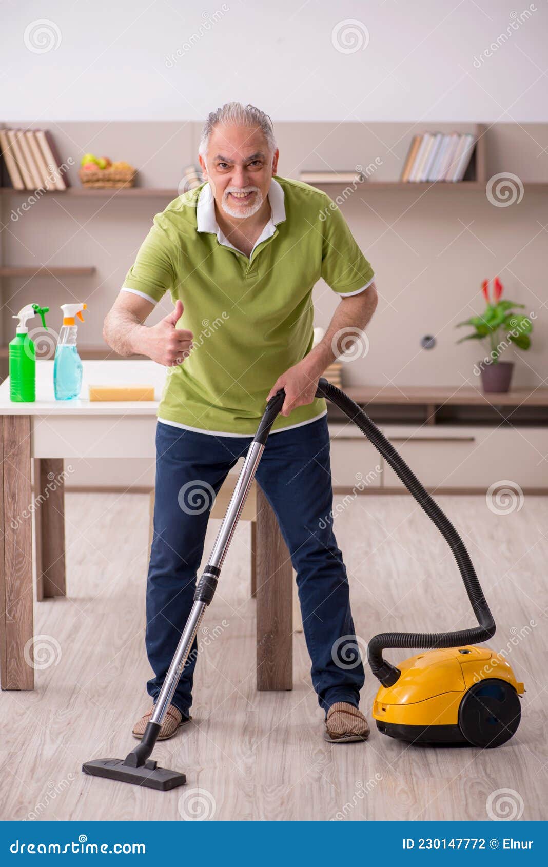 Old man cleaning the house stock photo. Image of dusting - 230147772