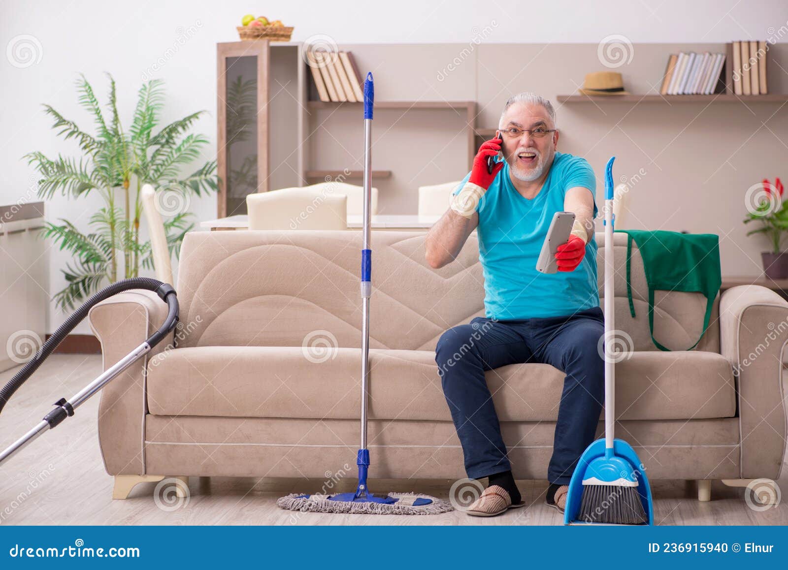 Old man cleaning the house stock photo. Image of home - 236915940
