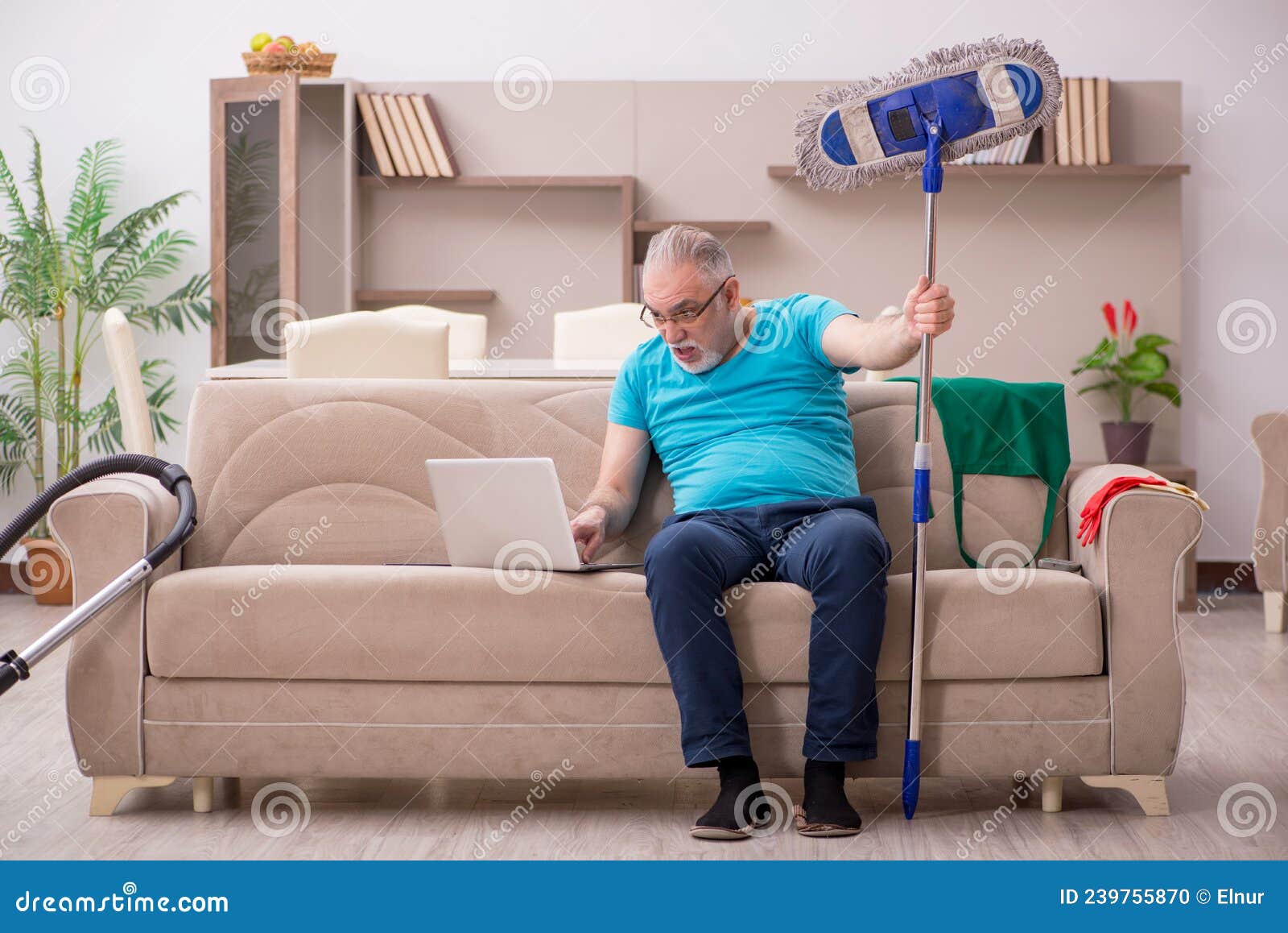 Old man cleaning the house stock photo. Image of husband - 239755870