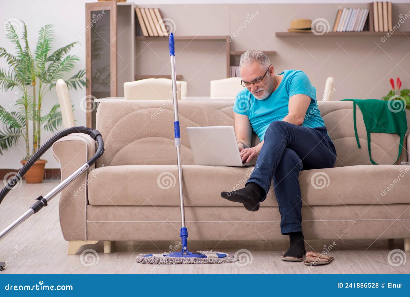 Old man cleaning the house stock photo. Image of floor - 241886528