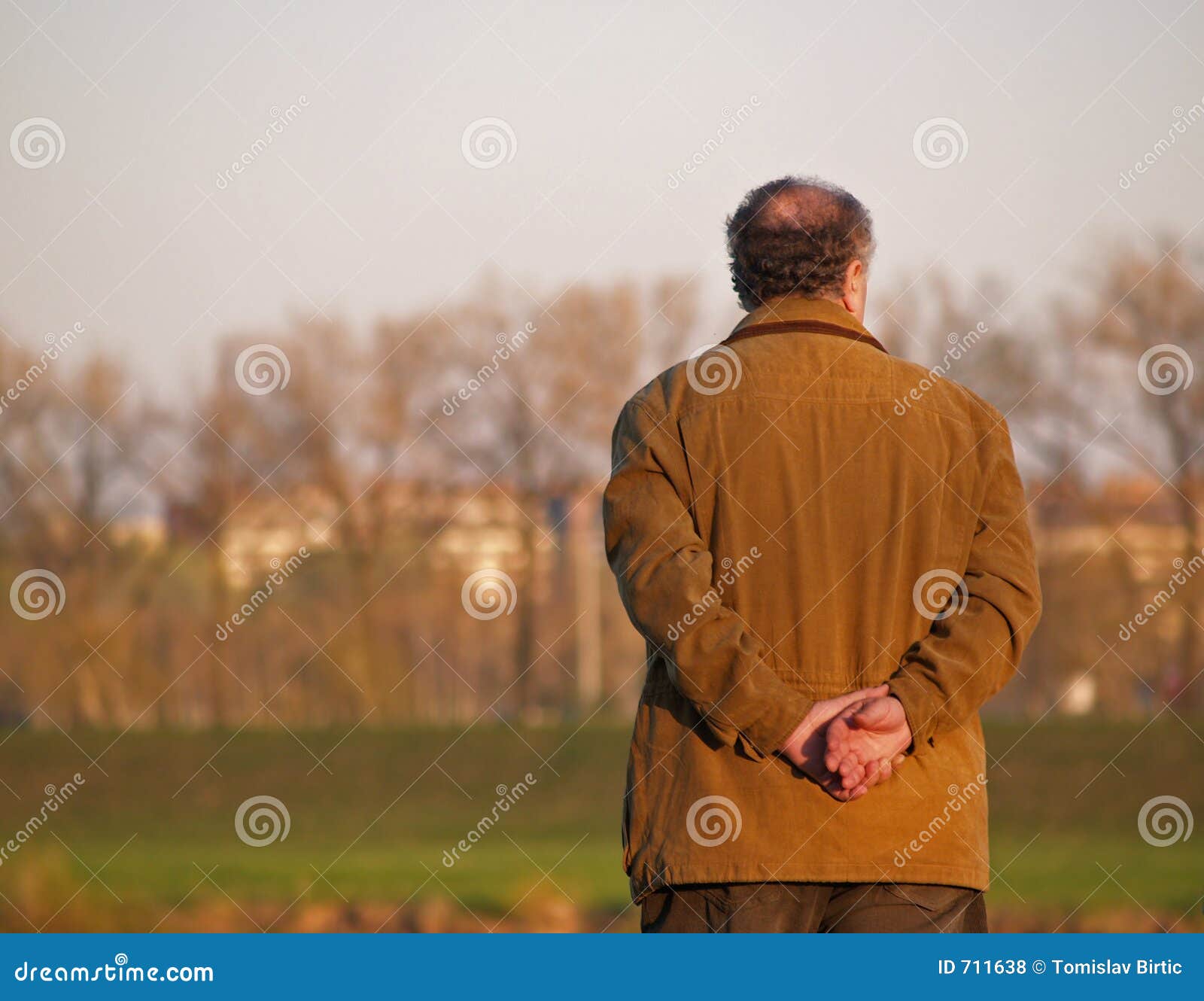 Old Man Contemplating at Promenade Stock Photo - Image of people, back ...