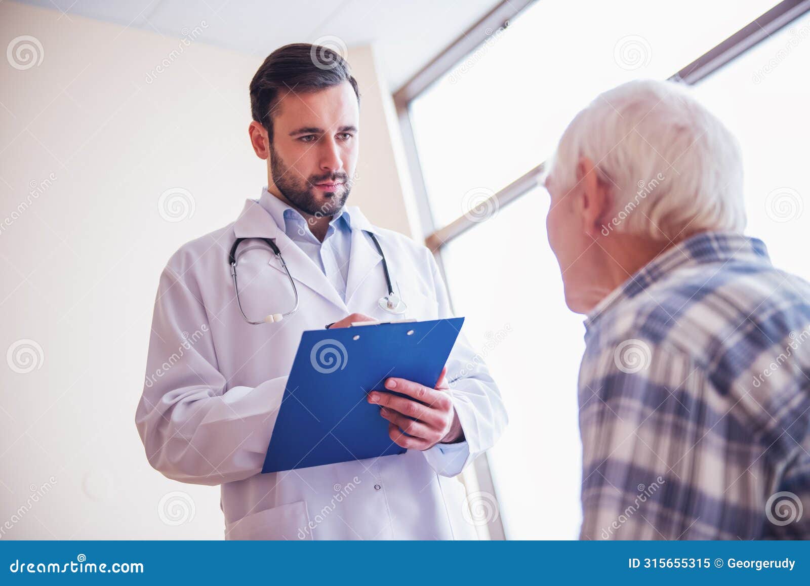 Old man and doctor stock image. Image of medical, notes - 315655315