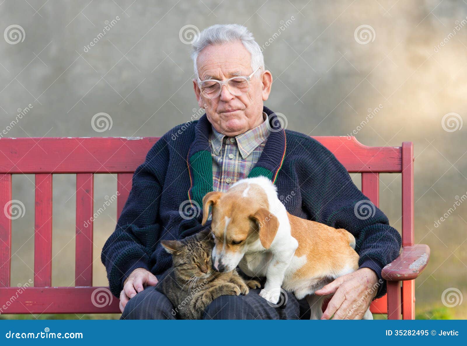 Old man with dog and cat stock image. Image of cuddle - 35282495