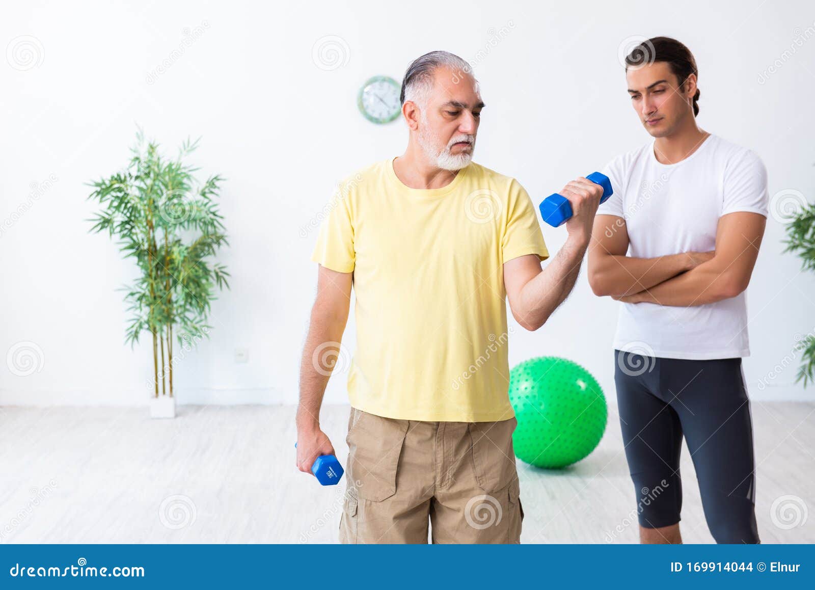Old Man Doing Exercises Indoors Stock Photo - Image of coach, mature ...