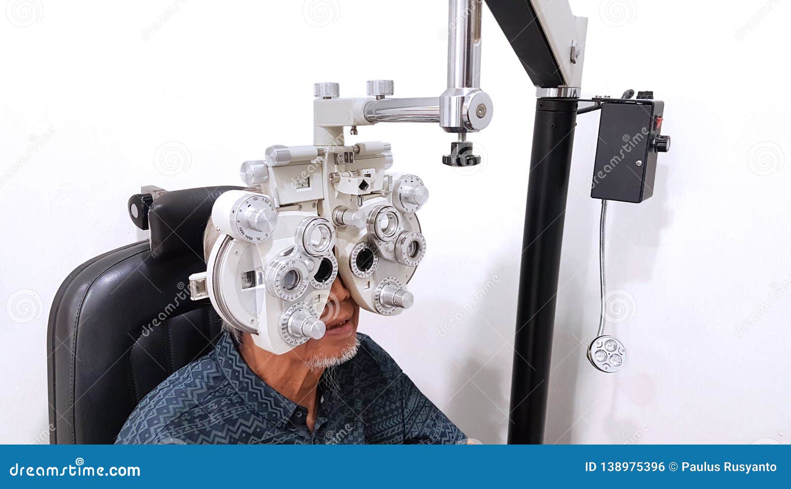 Old Man Doing Eyes Test by Using Phoropter Stock Photo - Image of ...