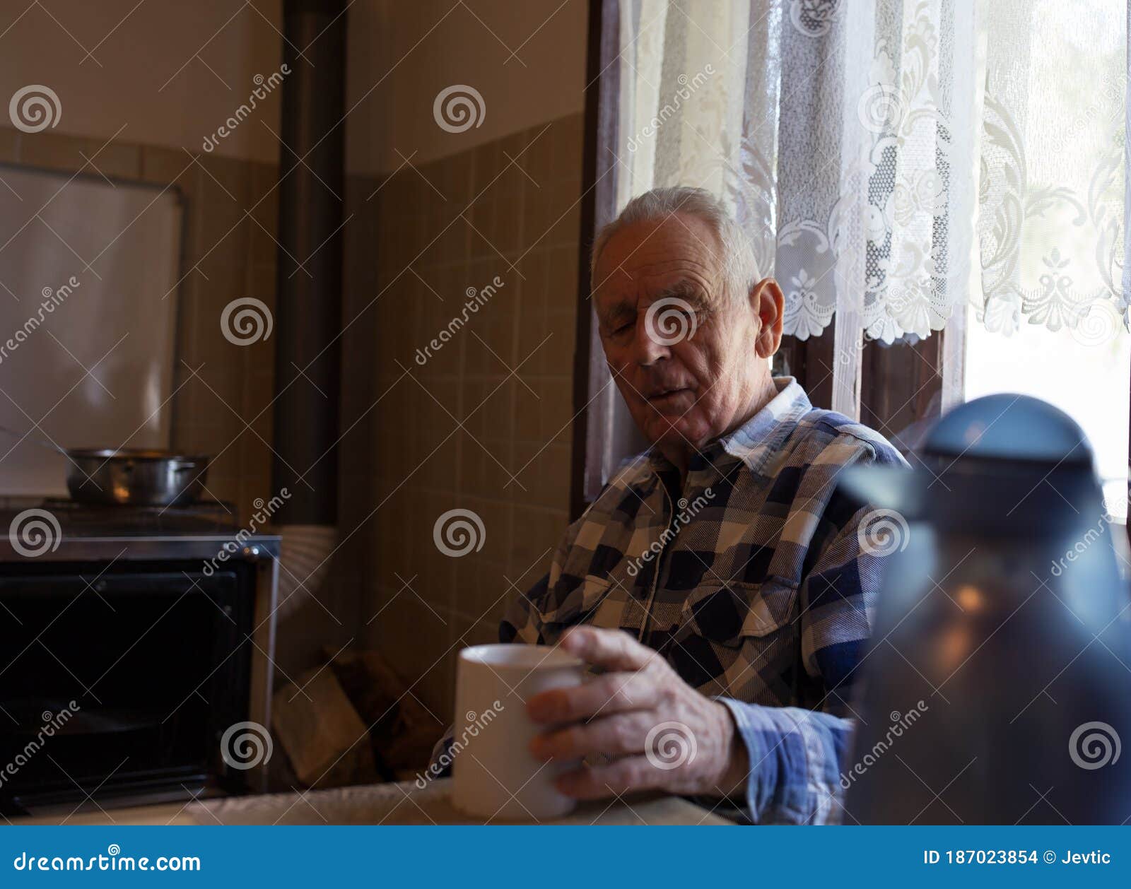 Old man drinking tea stock photo. Image of indoor, grandfather - 187023854