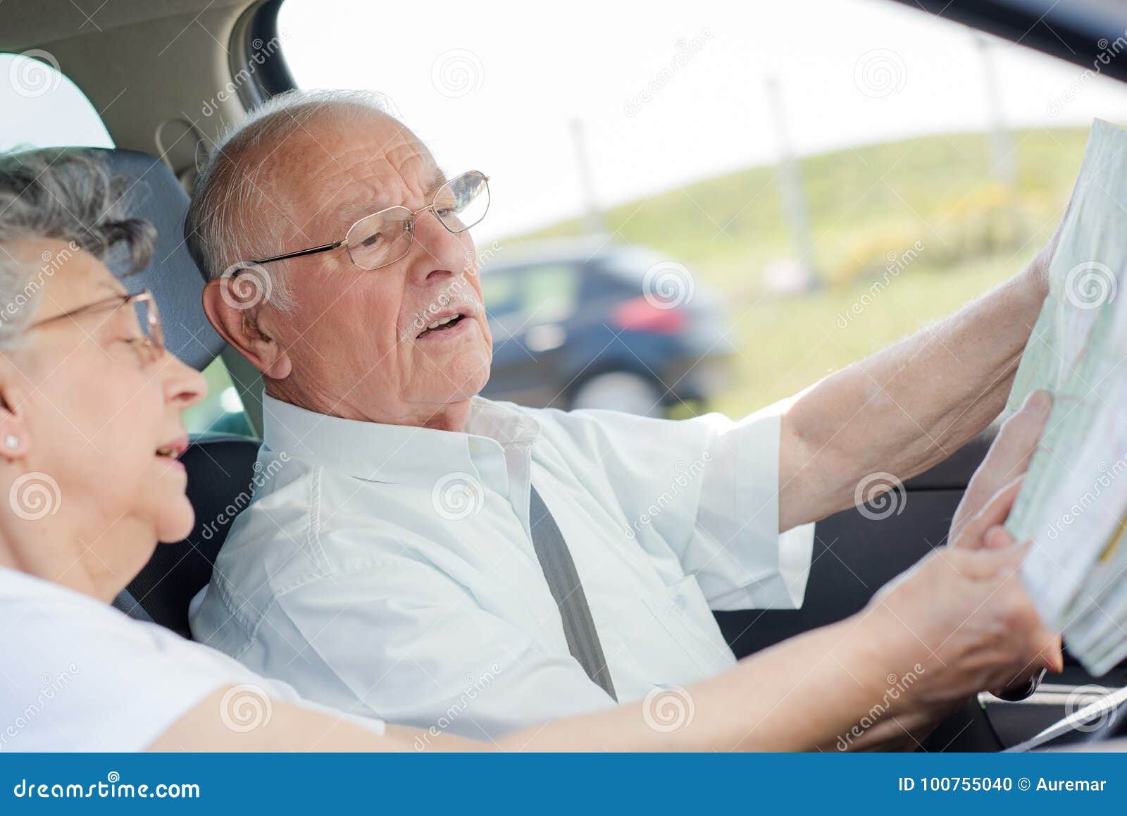 Old Man Driving Car while Checking Map Stock Photo - Image of glasses ...