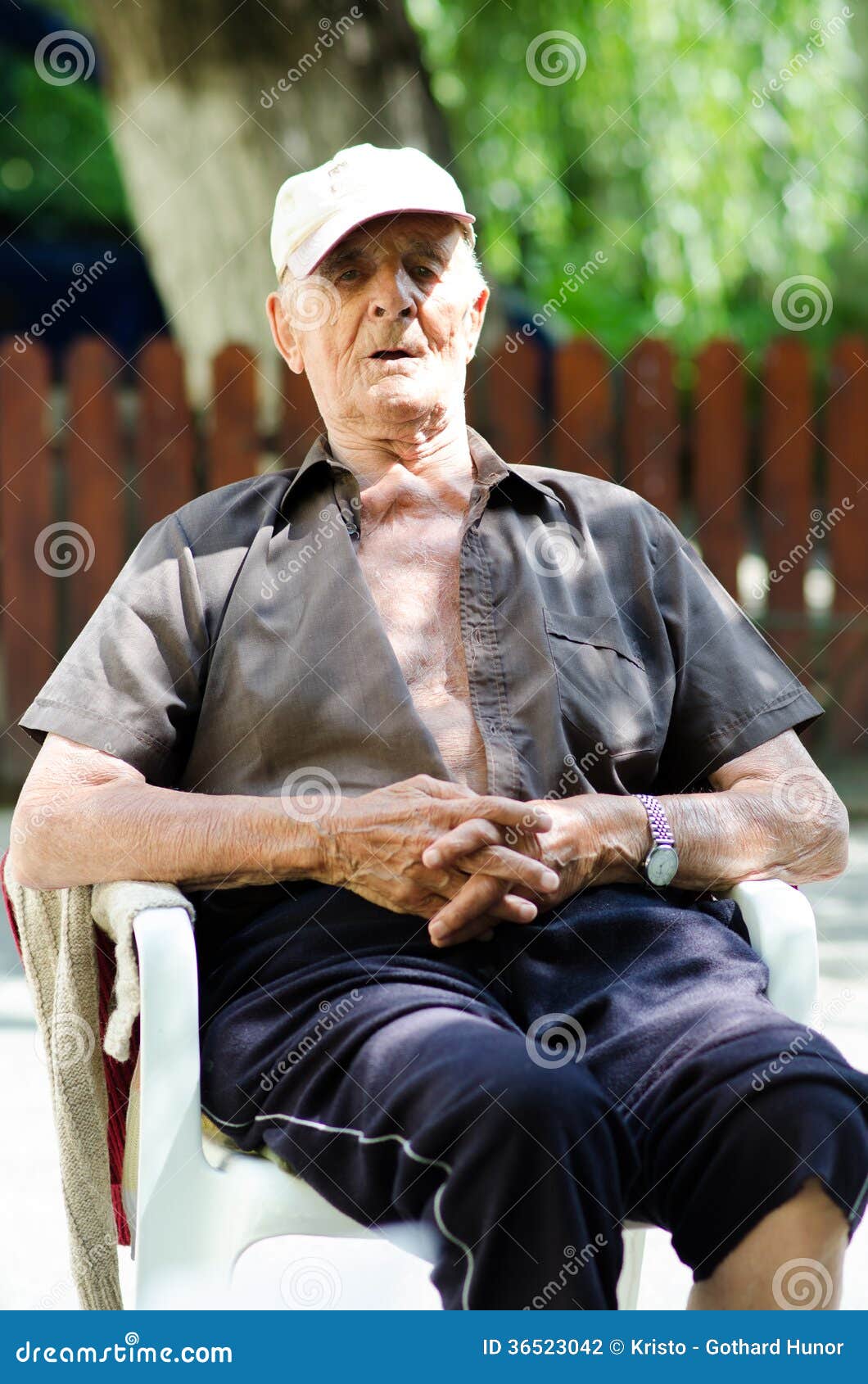 Old man enjoys sitting stock photo. Image of outdoor - 36523042
