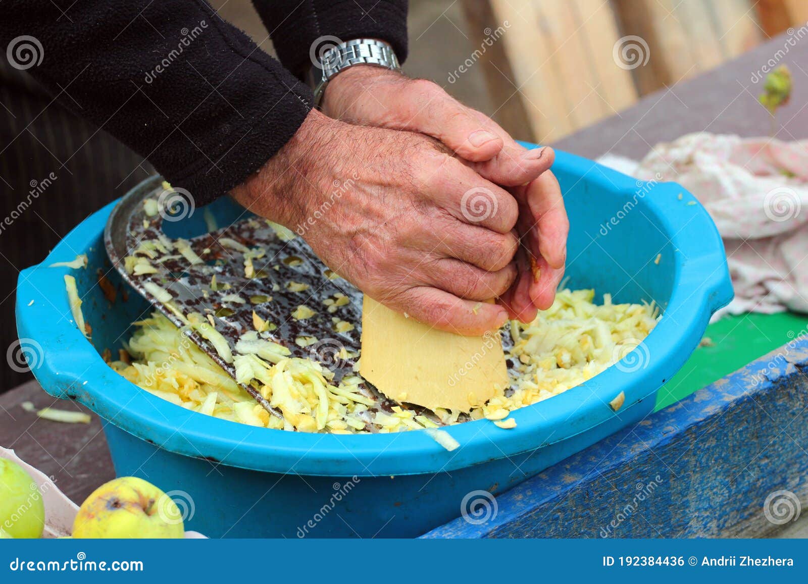 Old Man Grates a Squash. Hands Hold Grater and Vegetable Stock Photo ...