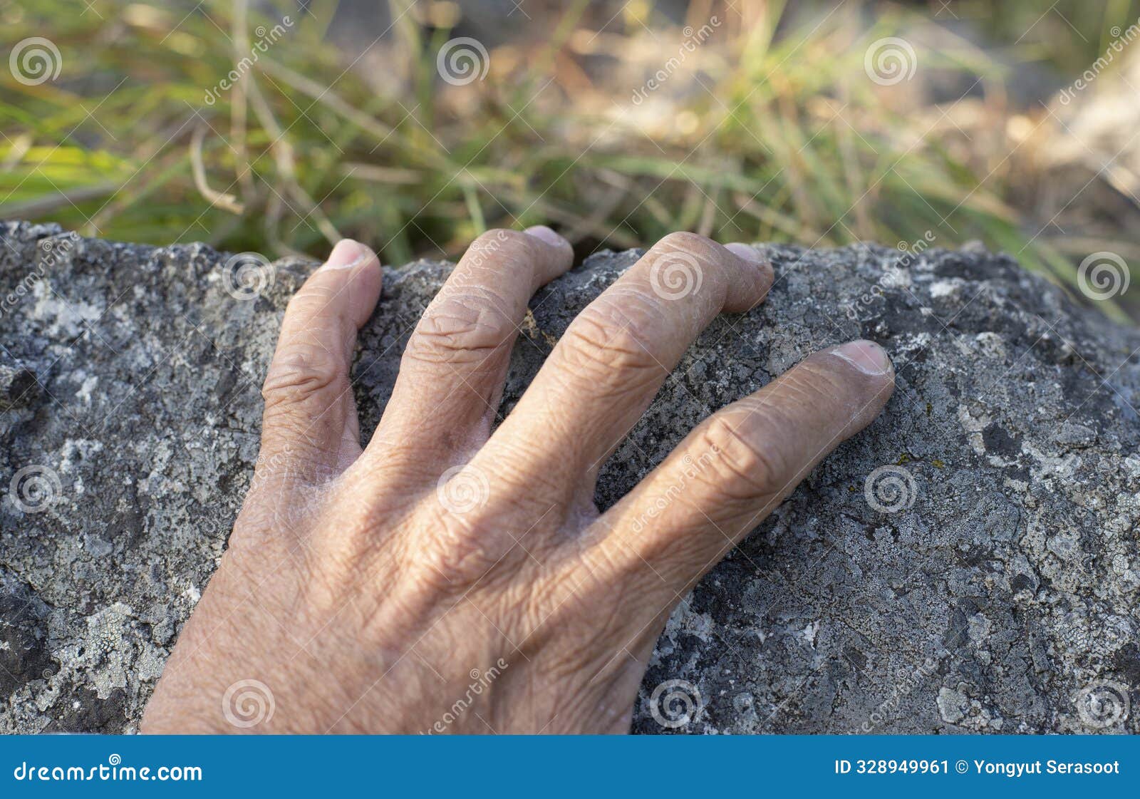 The Old Man Hand Was Grasping on the Rocky Surface Stock Image - Image ...