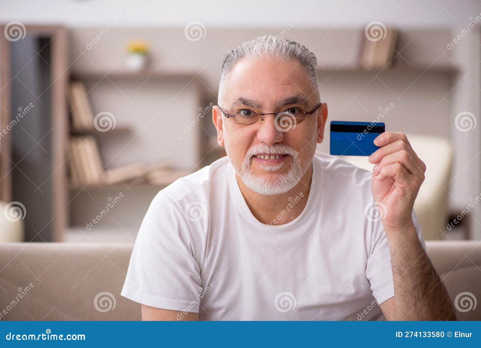 Old Man Holding Credit Card Stock Photo - Image of purchasing ...