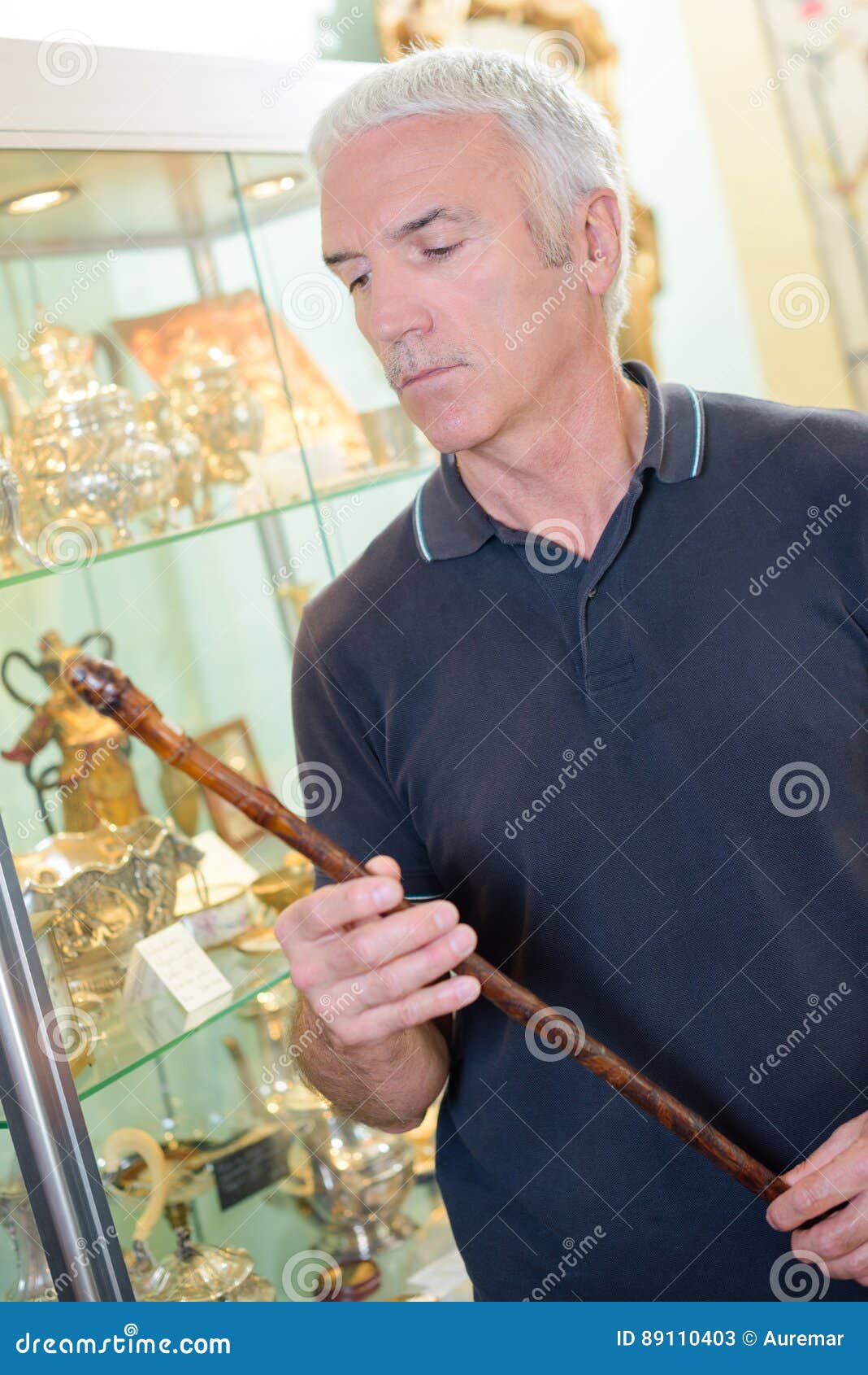 Old man holding stick stock image. Image of shop, quality - 89110403