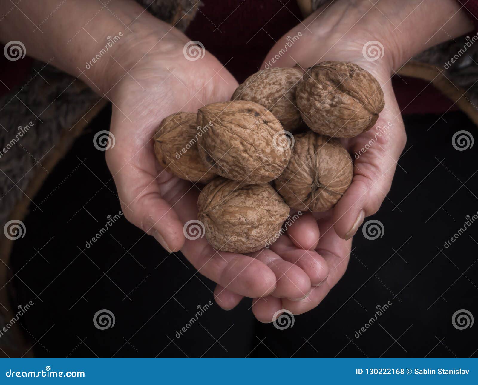 The Old Man Holds Walnuts in His Hands. Stock Photo - Image of food ...