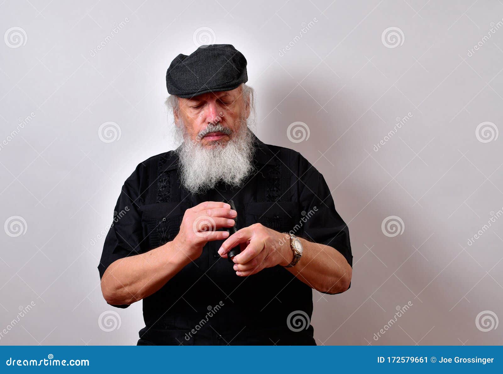 Old Man Inspecting Flashlight Stock Image - Image of holding, portrait ...