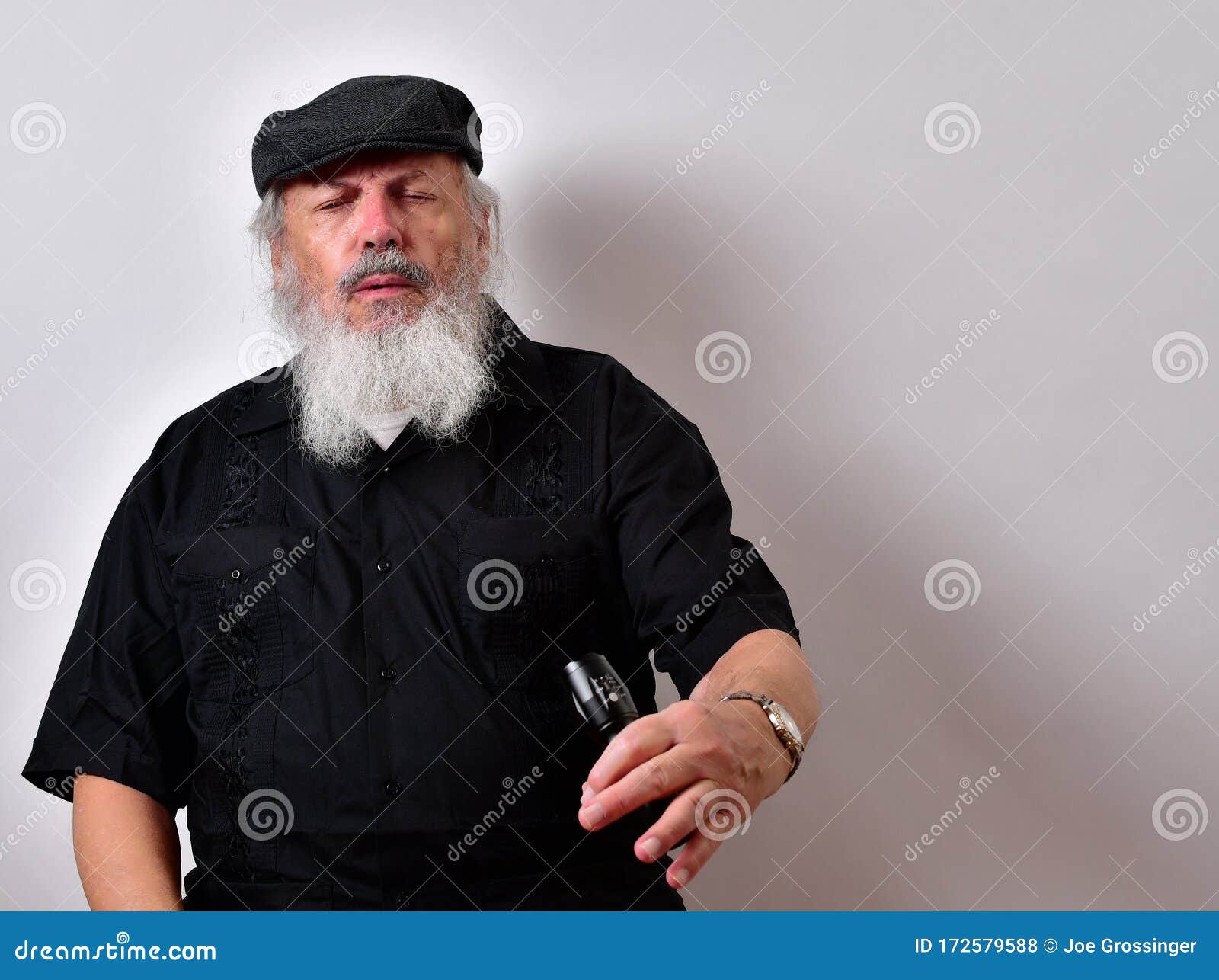 Old Man Inspecting Flashlight Stock Photo - Image of honor, trendy ...