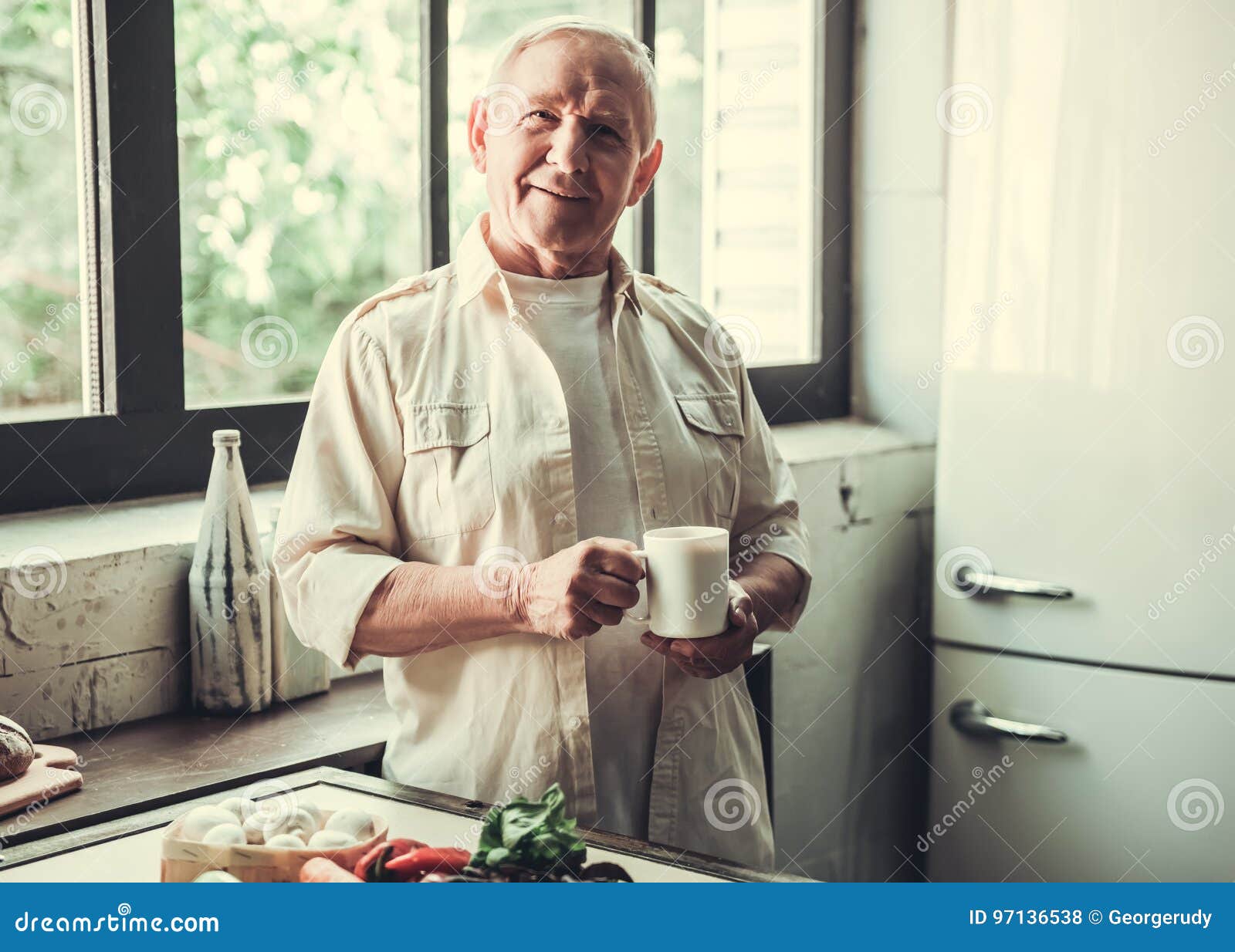 Old man in kitchen stock photo. Image of handsome, meal - 97136538