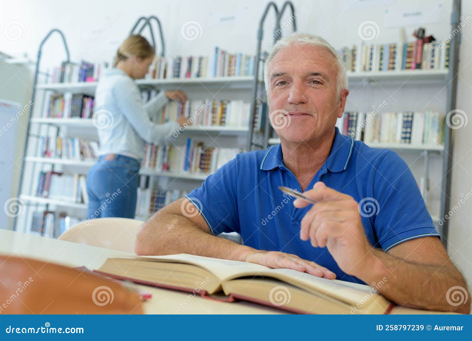 Old man in library stock image. Image of information - 258797239