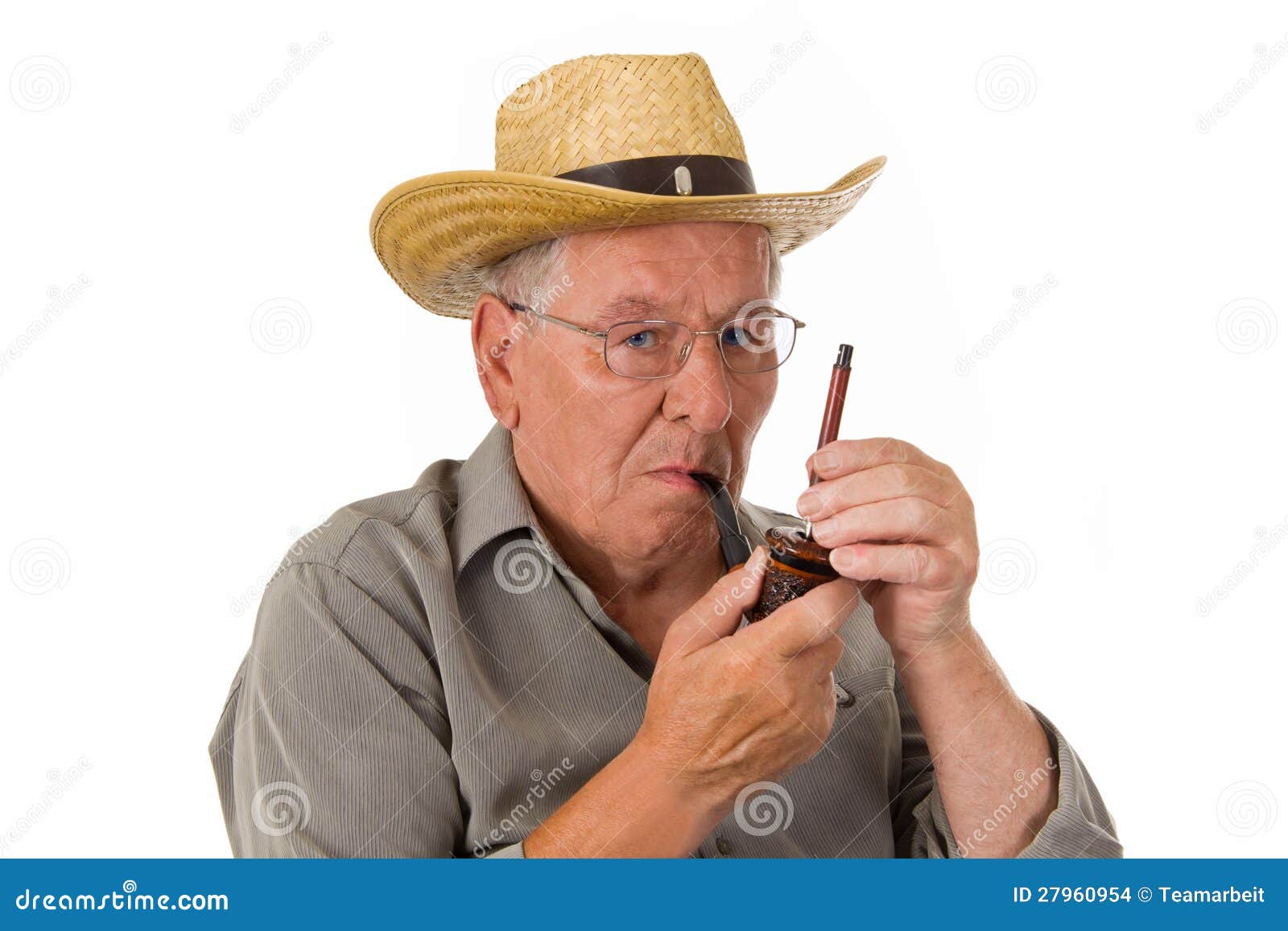 Old man lighting up a pipe stock photo. Image of face - 27960954