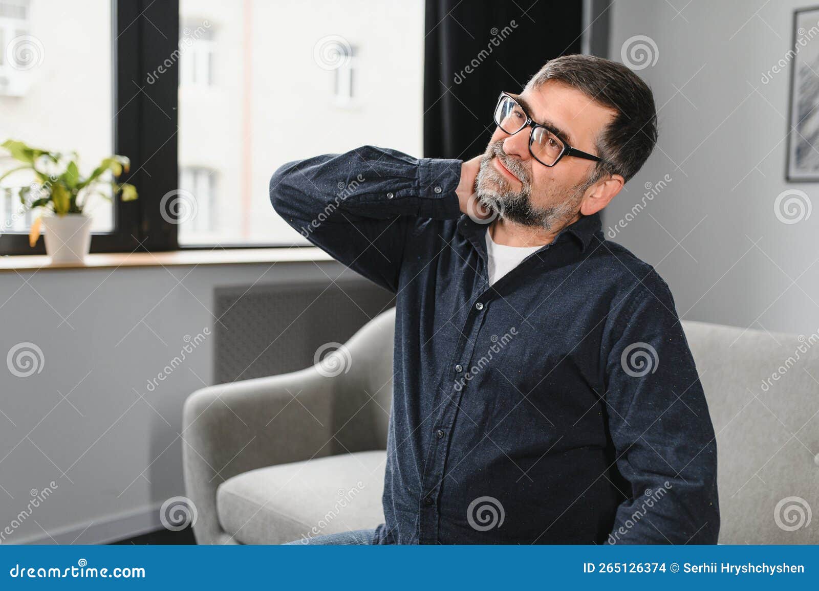 Old man with neck pain stock photo. Image of person - 265126374