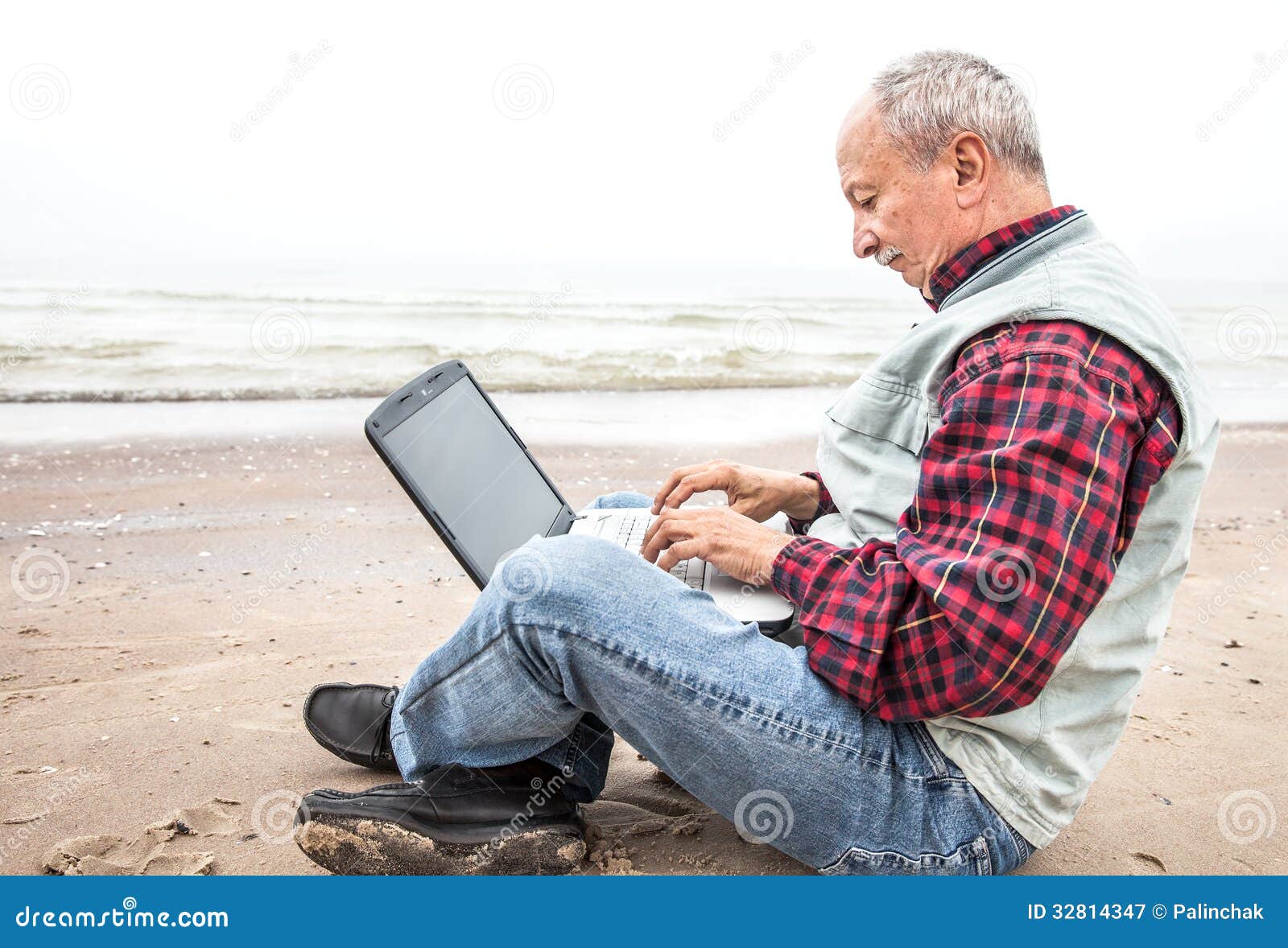 Old Man with Notebook on Beach Stock Image - Image of mobile, laptop ...