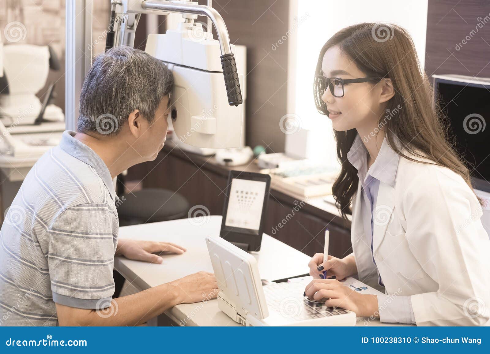 Old man with optometrist stock photo. Image of aged - 100238310