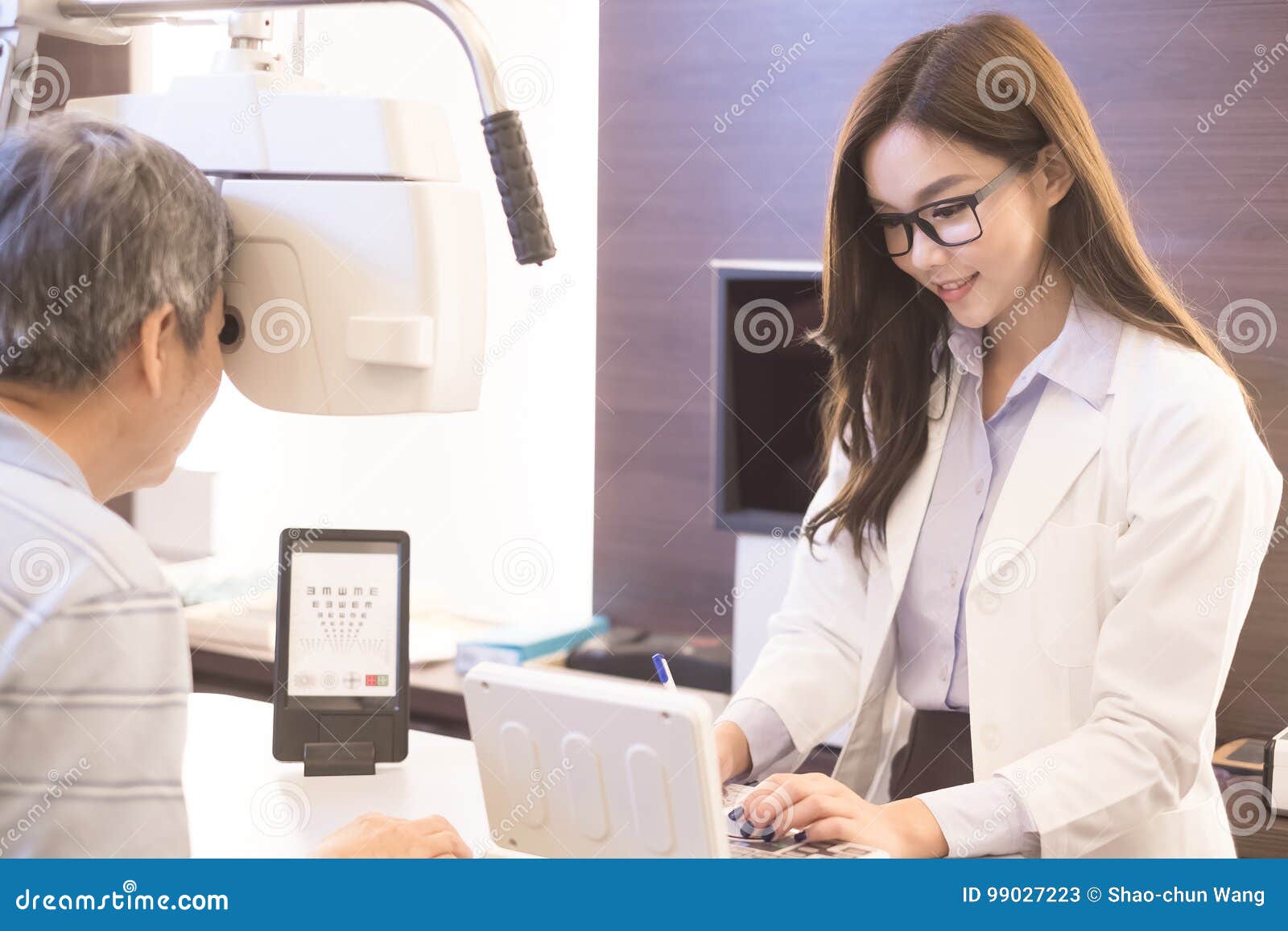 Old man with optometrist stock image. Image of indoors - 99027223