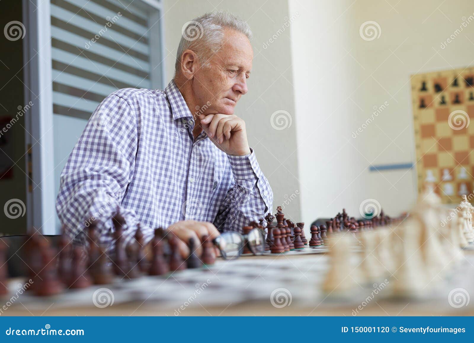 Old man playing chess stock photo. Image of risk, class - 150001120