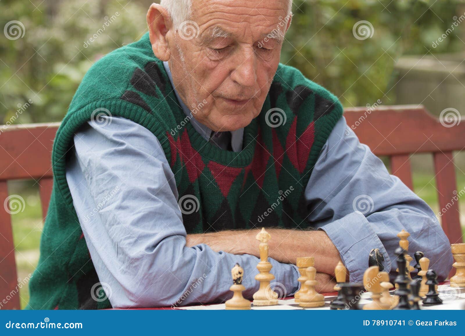 Old man playing chess stock image. Image of analyzing - 78910741