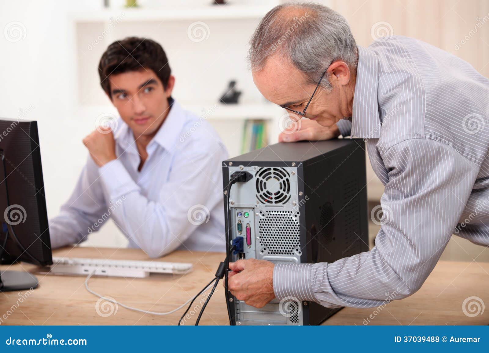 Old man plugs a computer stock photo. Image of group - 37039488
