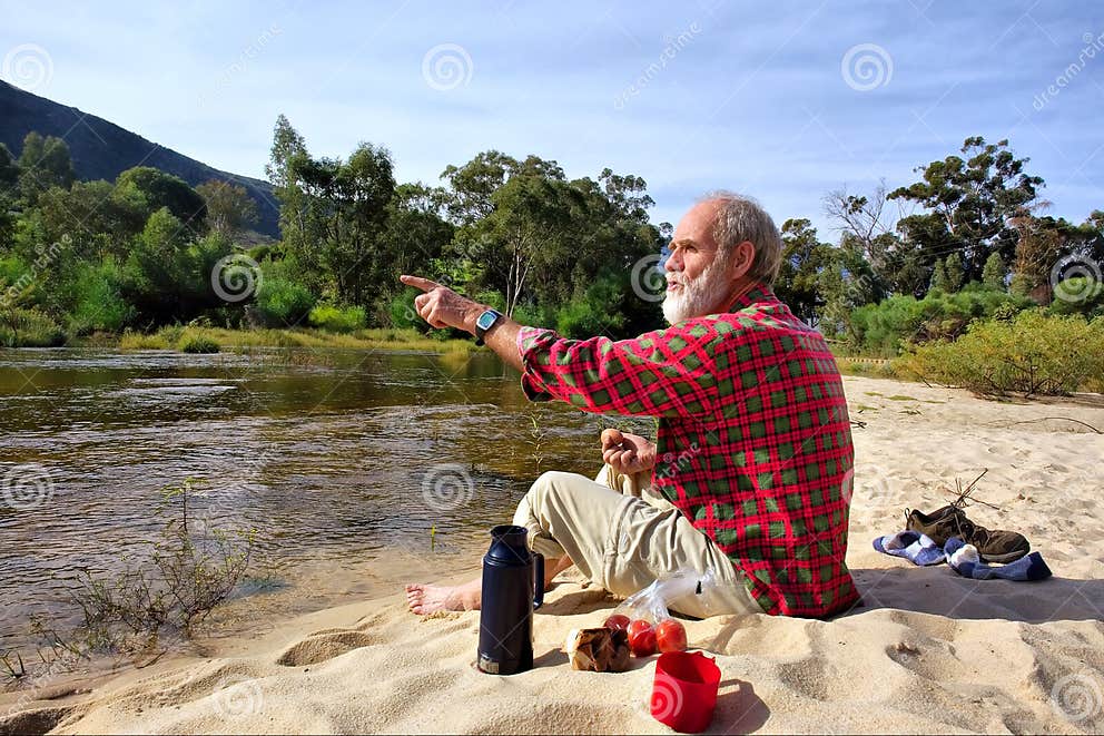 Old Man Points Somewhere while Having Lunch Stock Photo - Image of ...
