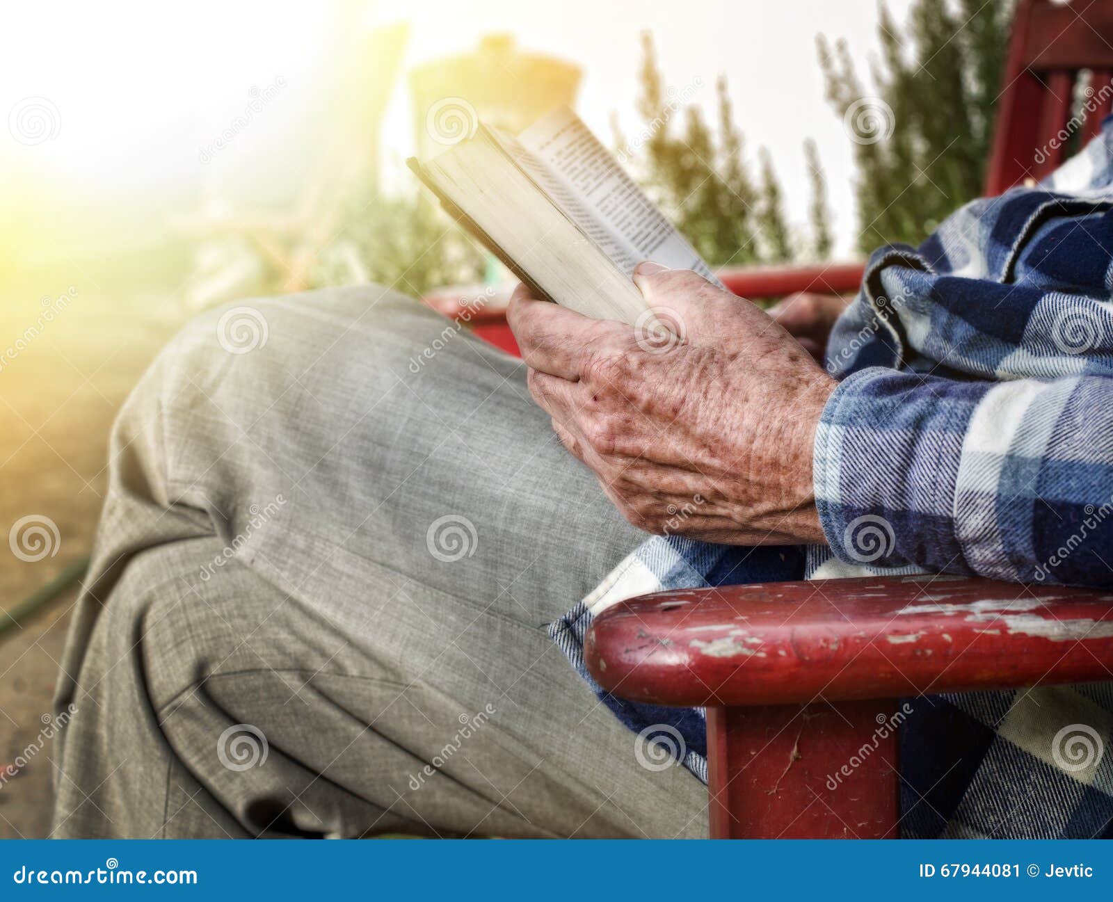 Old man reading book stock image. Image of holding, close - 67944081