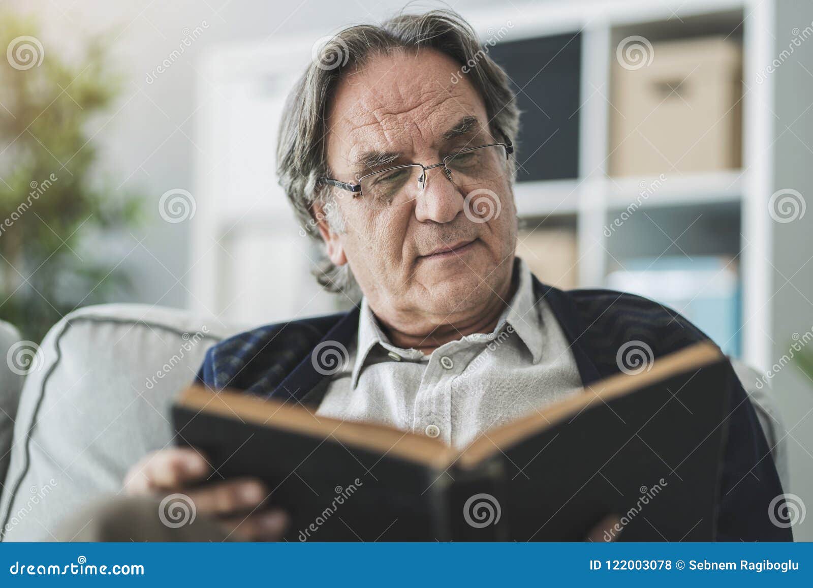 Old Man Reading Book at Home Stock Photo - Image of read, glasses ...