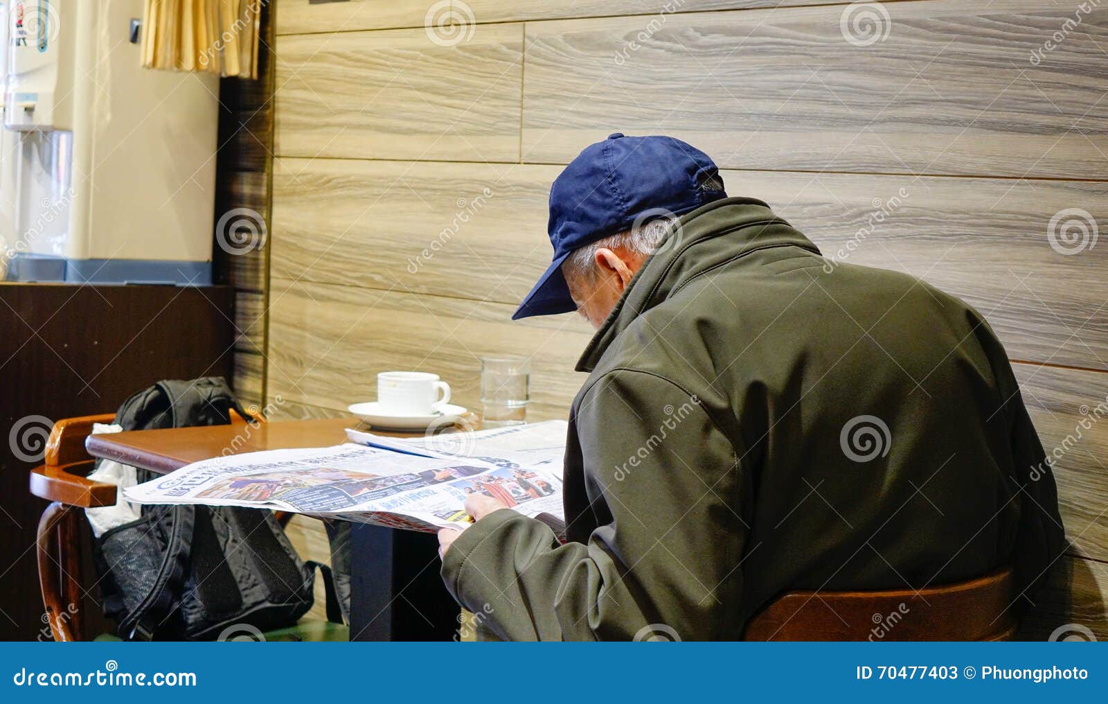 An Old Man Reading News at the Coffee Shop in Taipei Editorial Stock ... An Old Man Reading News at the Coffee Shop in Taipei Editorial Stock ...