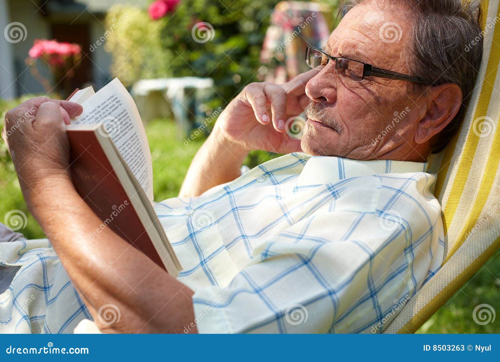 Old man reading outdoor stock image. Image of american - 8503263