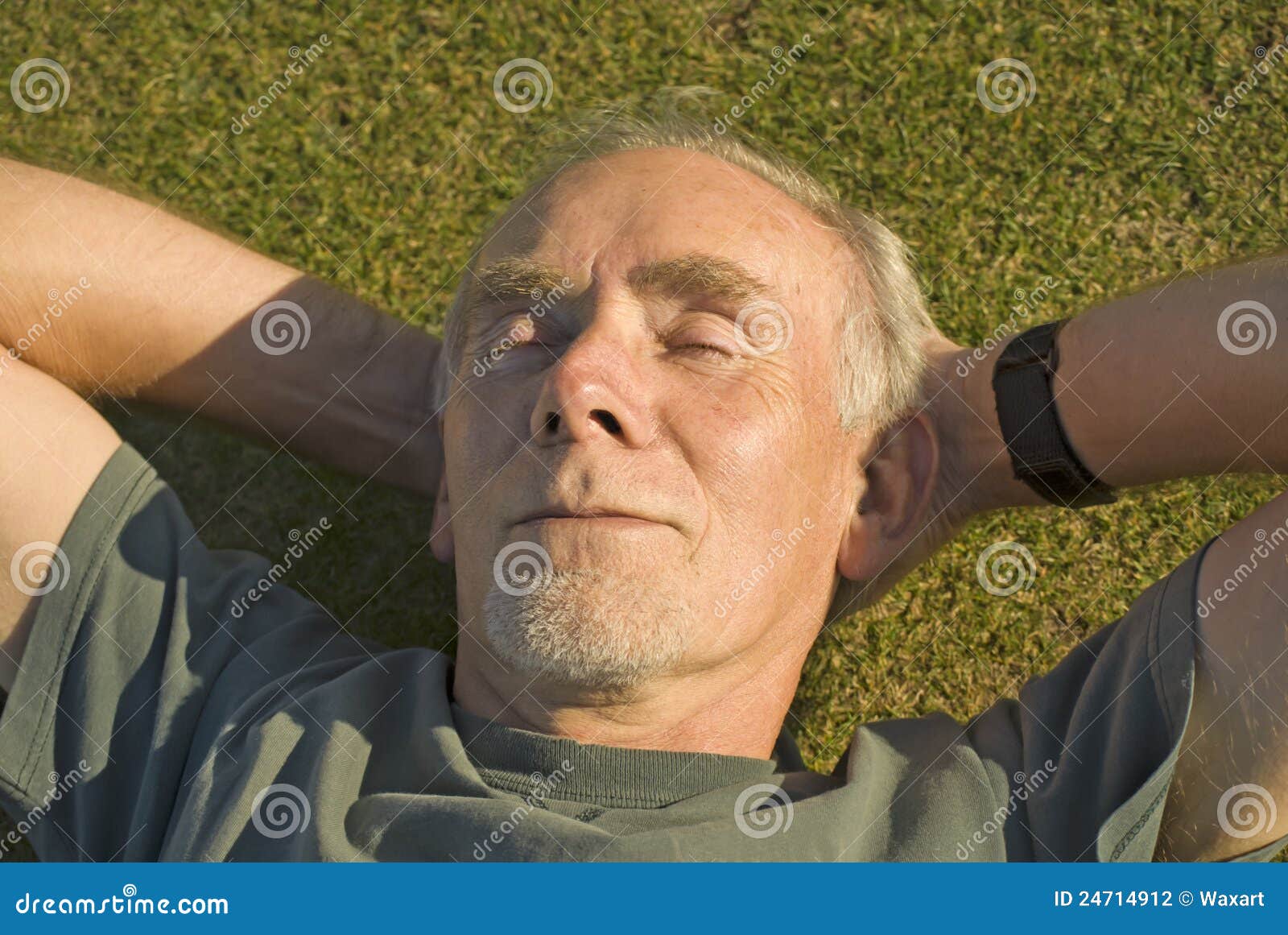 Old Man Relaxing in the Sun on Grass Stock Photo - Image of bliss ...