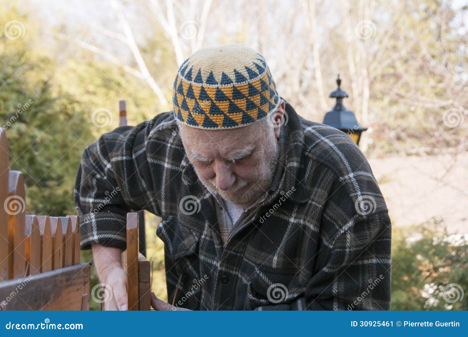 Old man repairing a gate stock image. Image of gate, hobby - 30925461