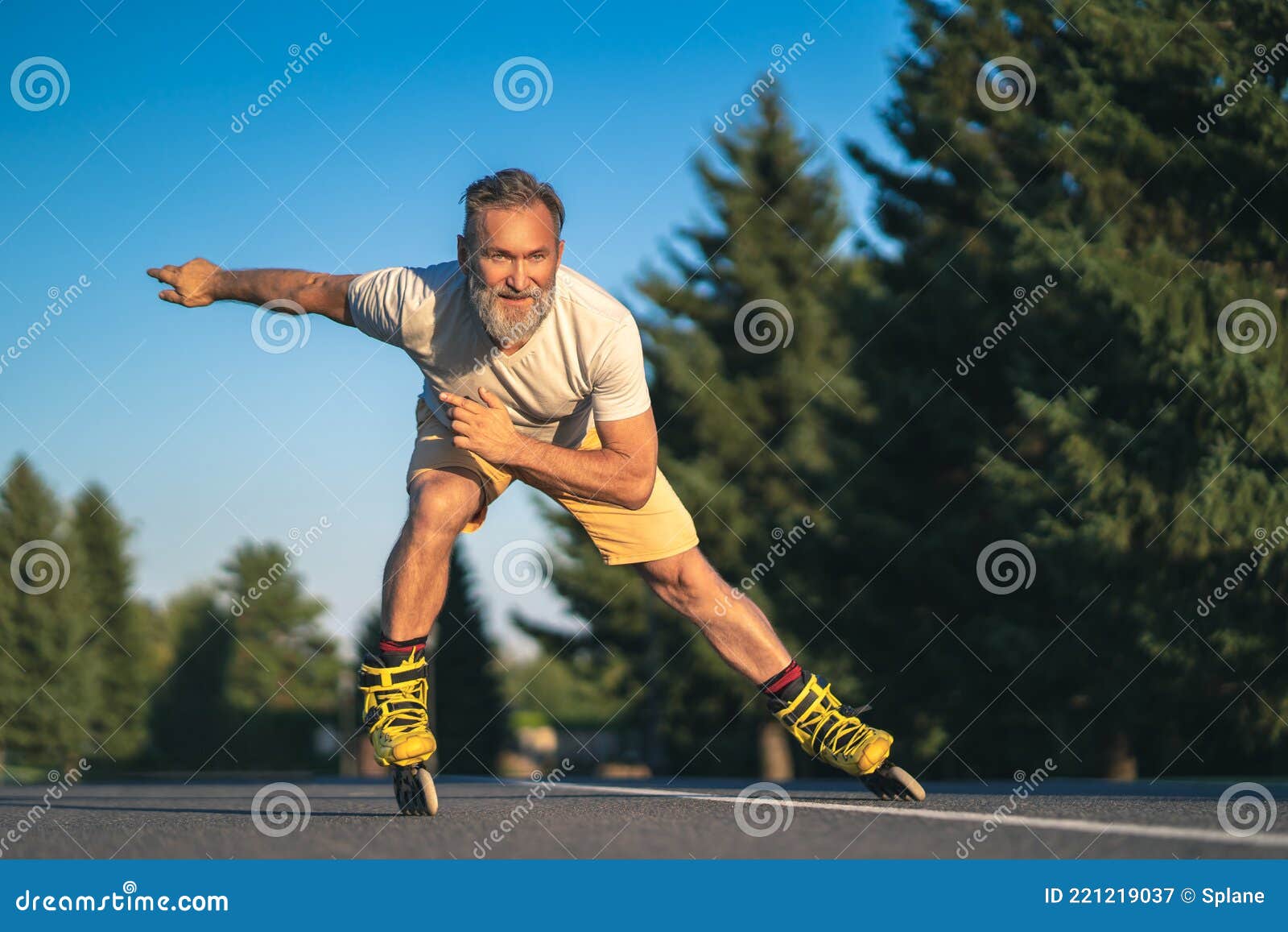 The Old Man Rollerblading on the Alley. Stock Image - Image of health ...