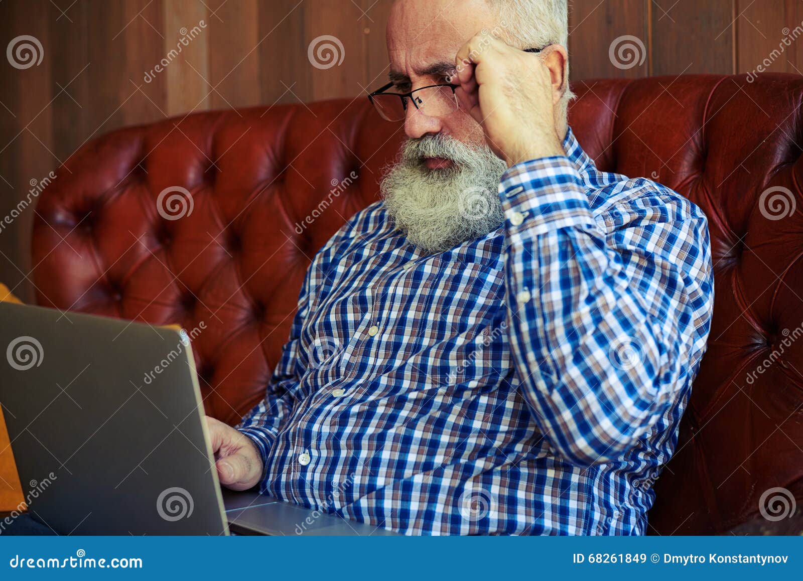 Old Man Sitting on Couch and Working with Laptop Stock Image - Image of ...