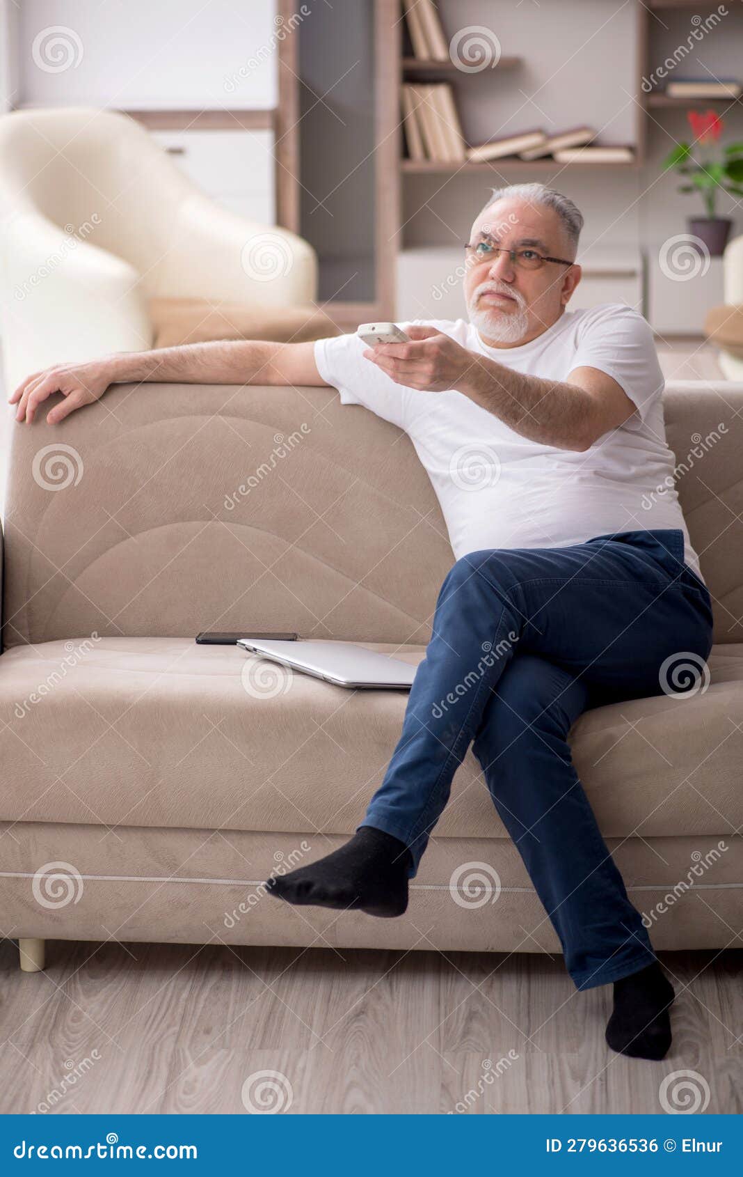 Old man sitting at home stock photo. Image of hours - 279636536