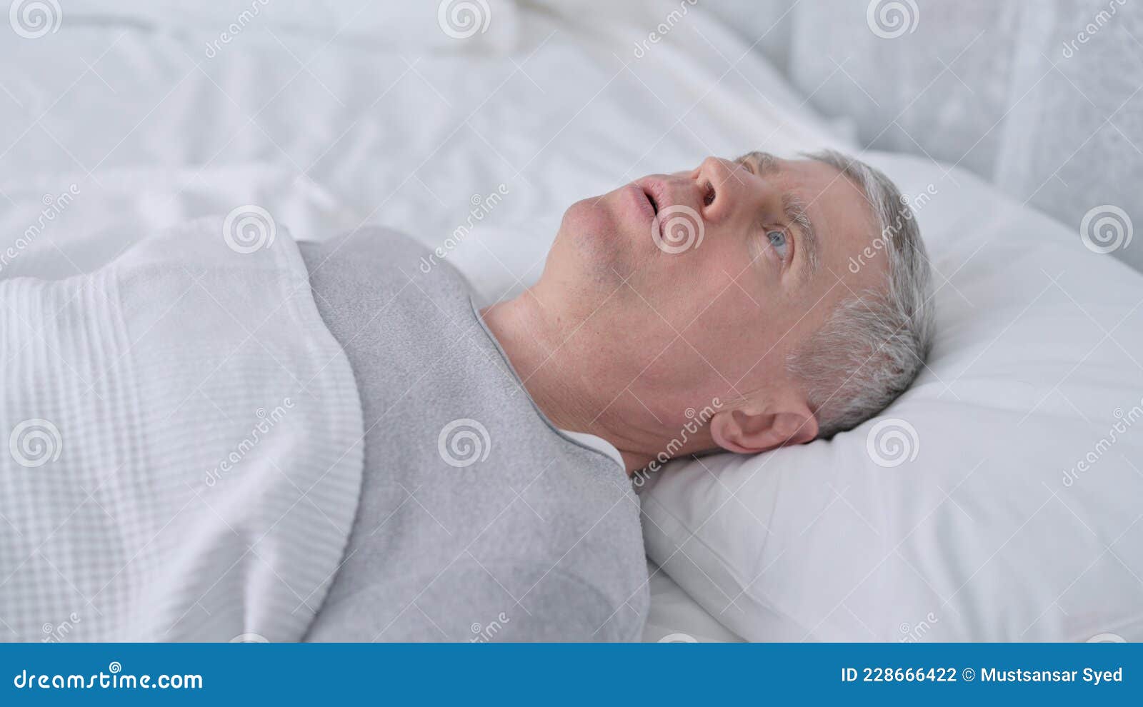 Old Man Sleeping in Bed and Having Nightmare Stock Photo - Image of ...