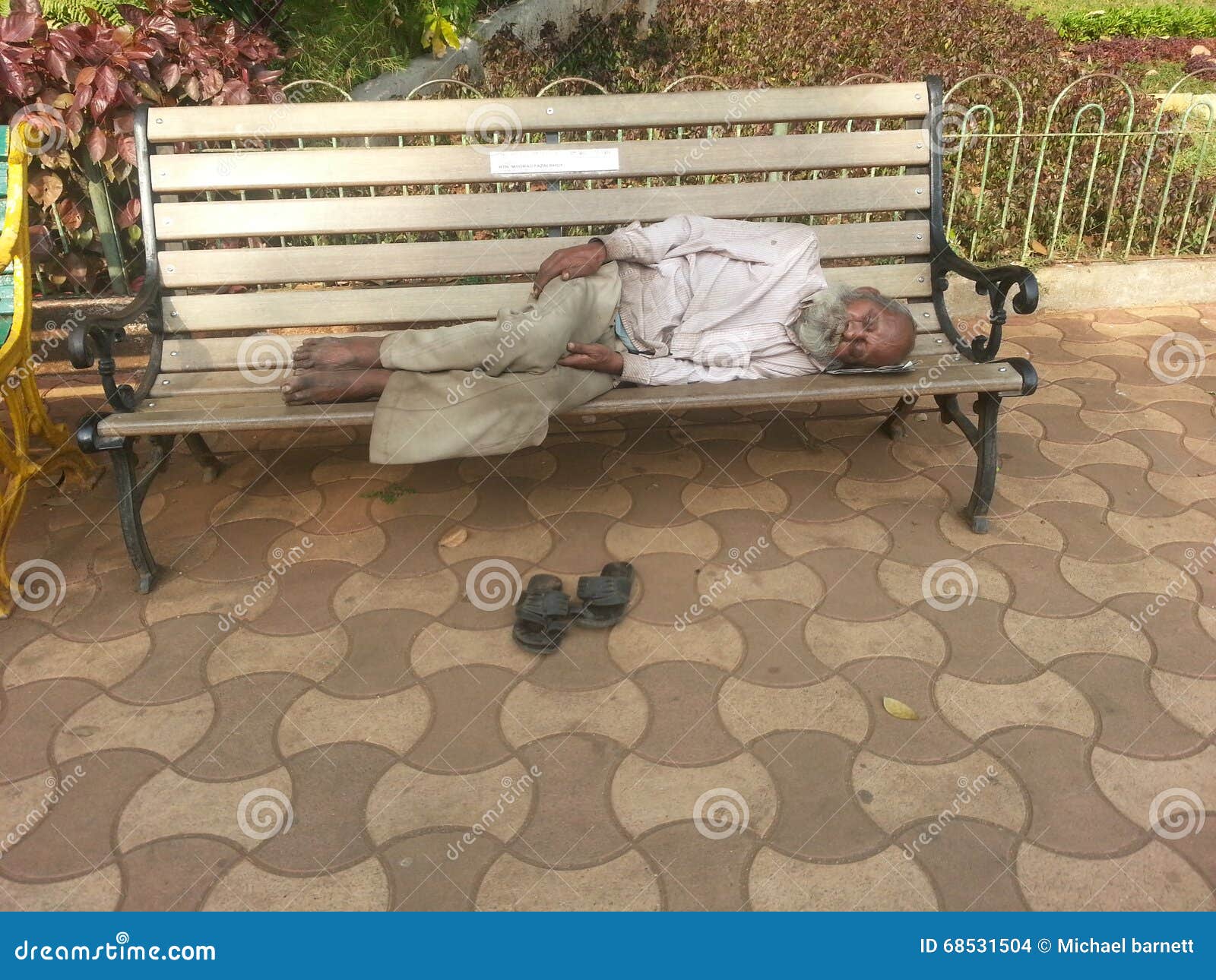 Old man sleeping on bench editorial stock image. Image of oark - 68531504