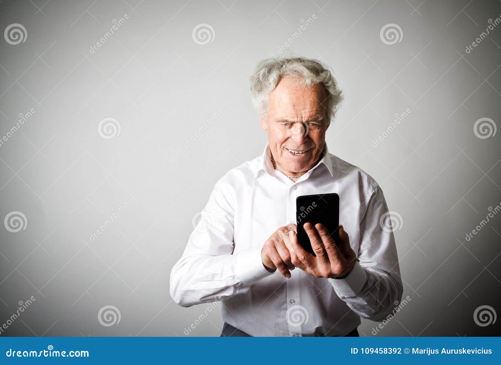 Old man and smart phone. stock photo. Image of funny - 109458392