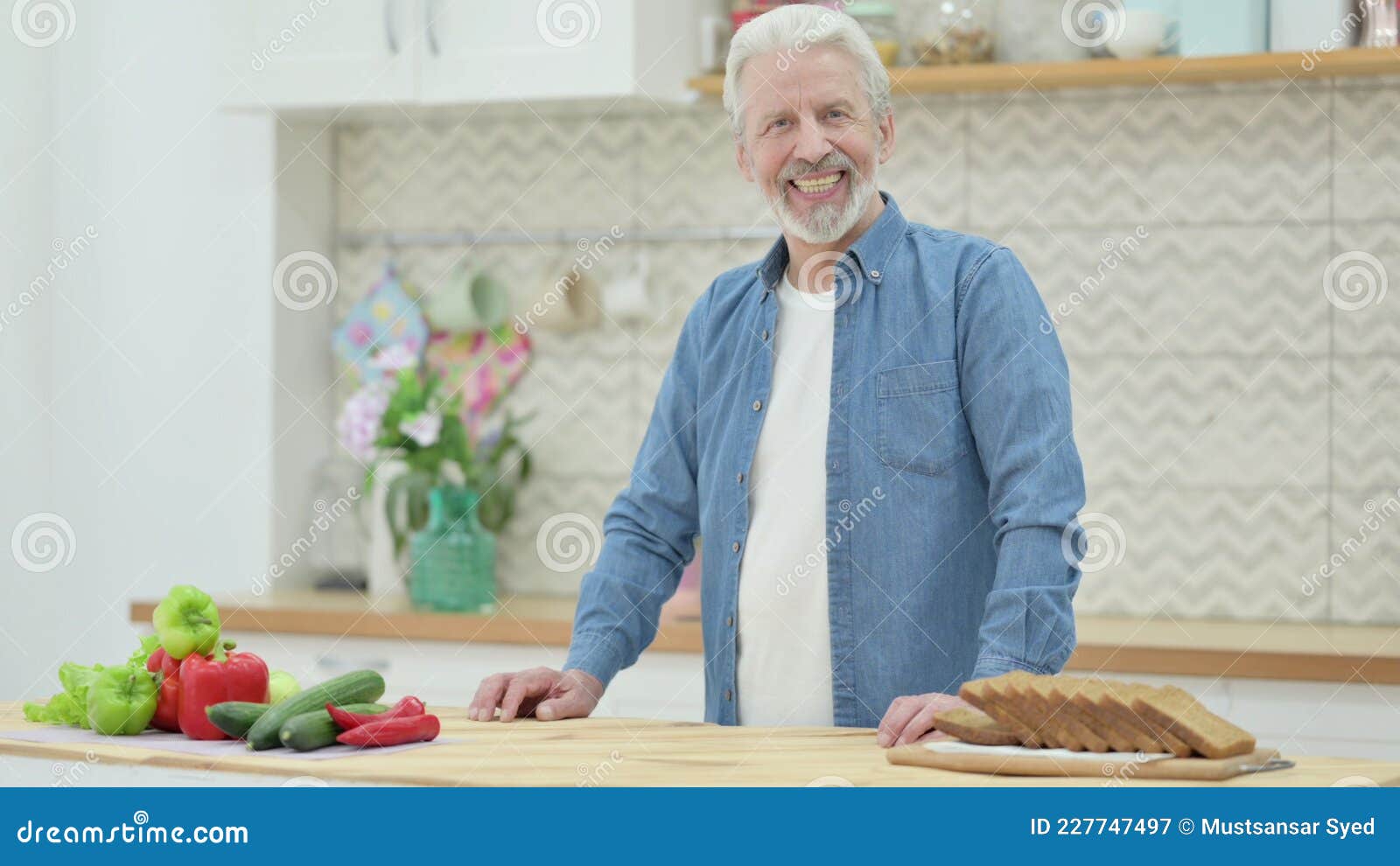 Old Man Smiling at the Camera while Standing in Kitchen Stock Image ...