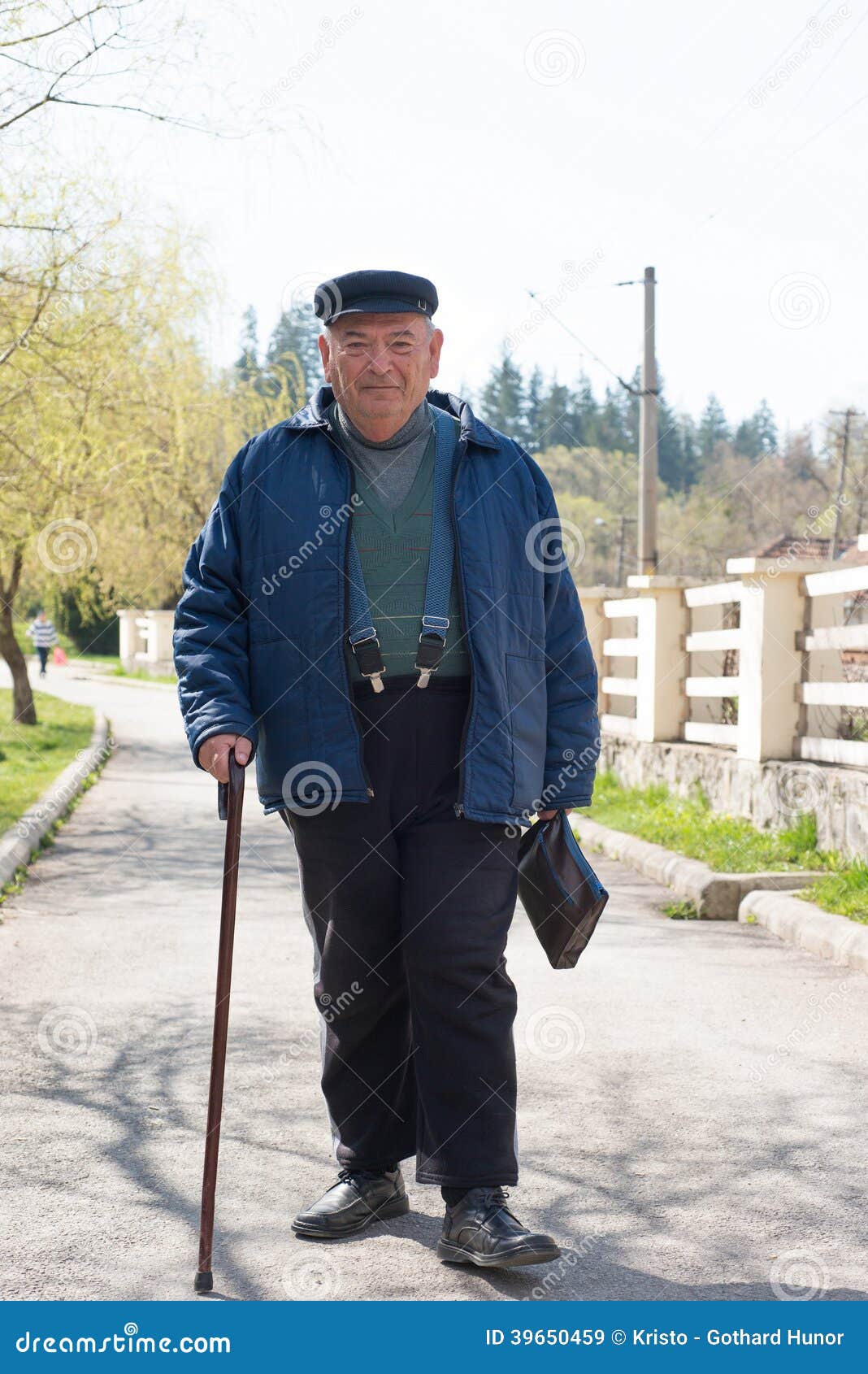 Old Man Standing With Cane